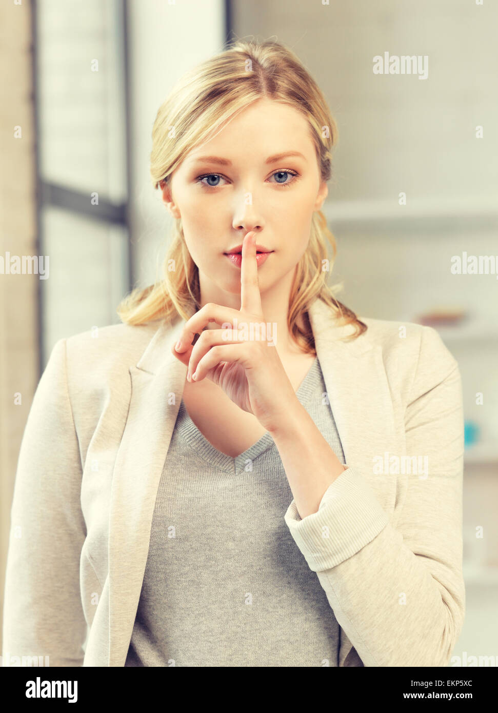finger on lips Stock Photo - Alamy