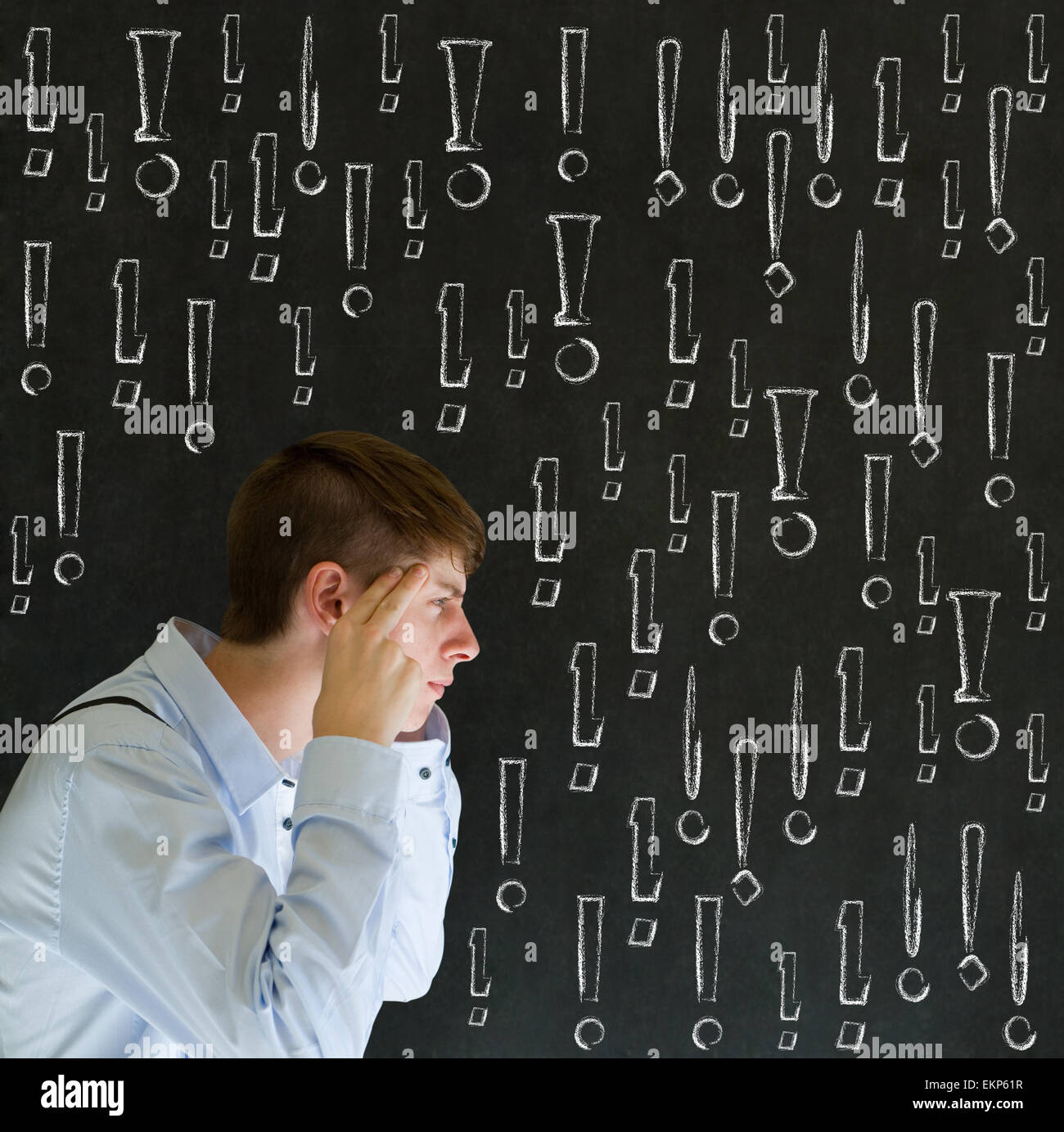 Thinking business man with chalk exclamation marks Stock Photo - Alamy