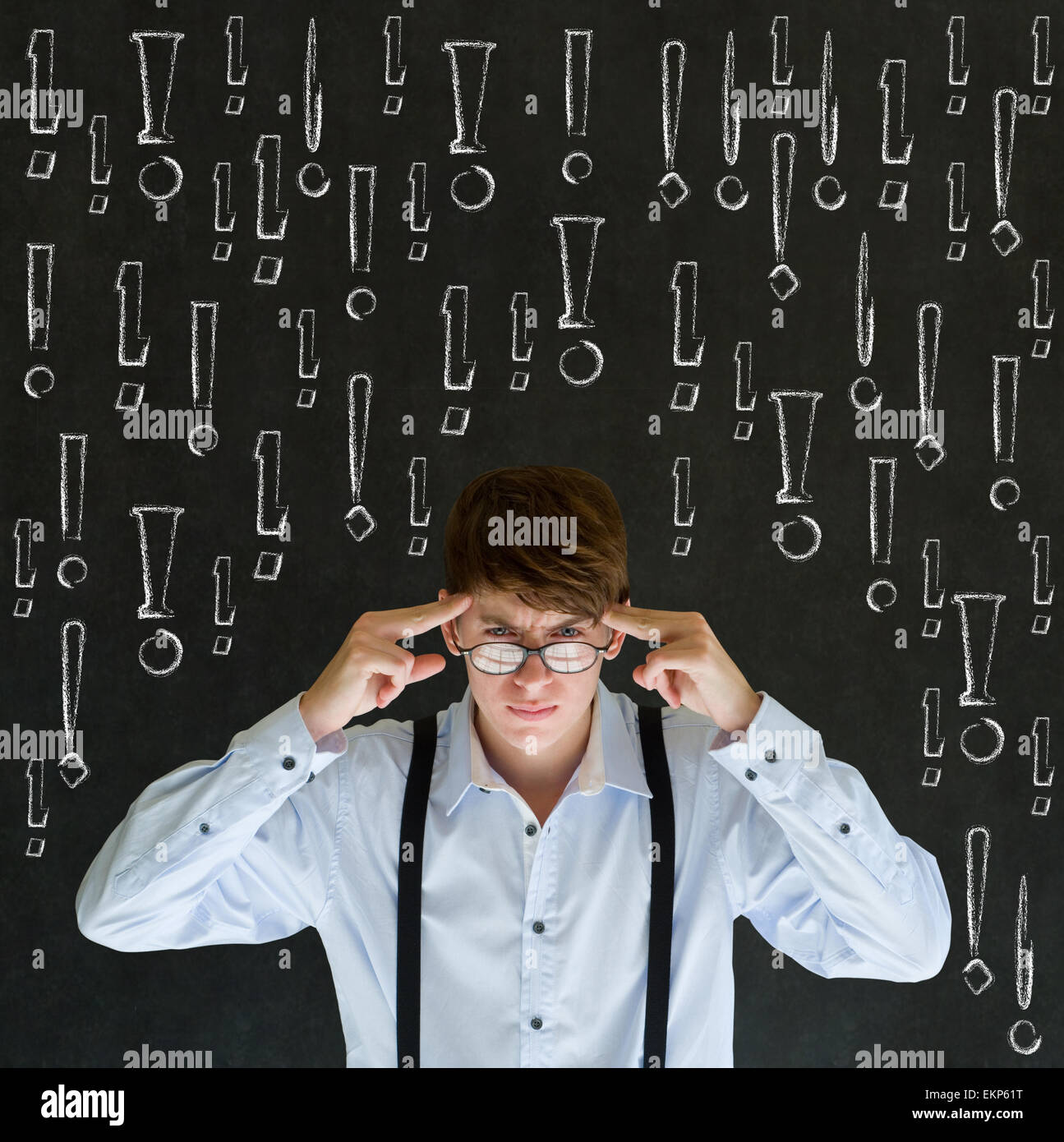 Thinking business man with chalk exclamation marks Stock Photo - Alamy