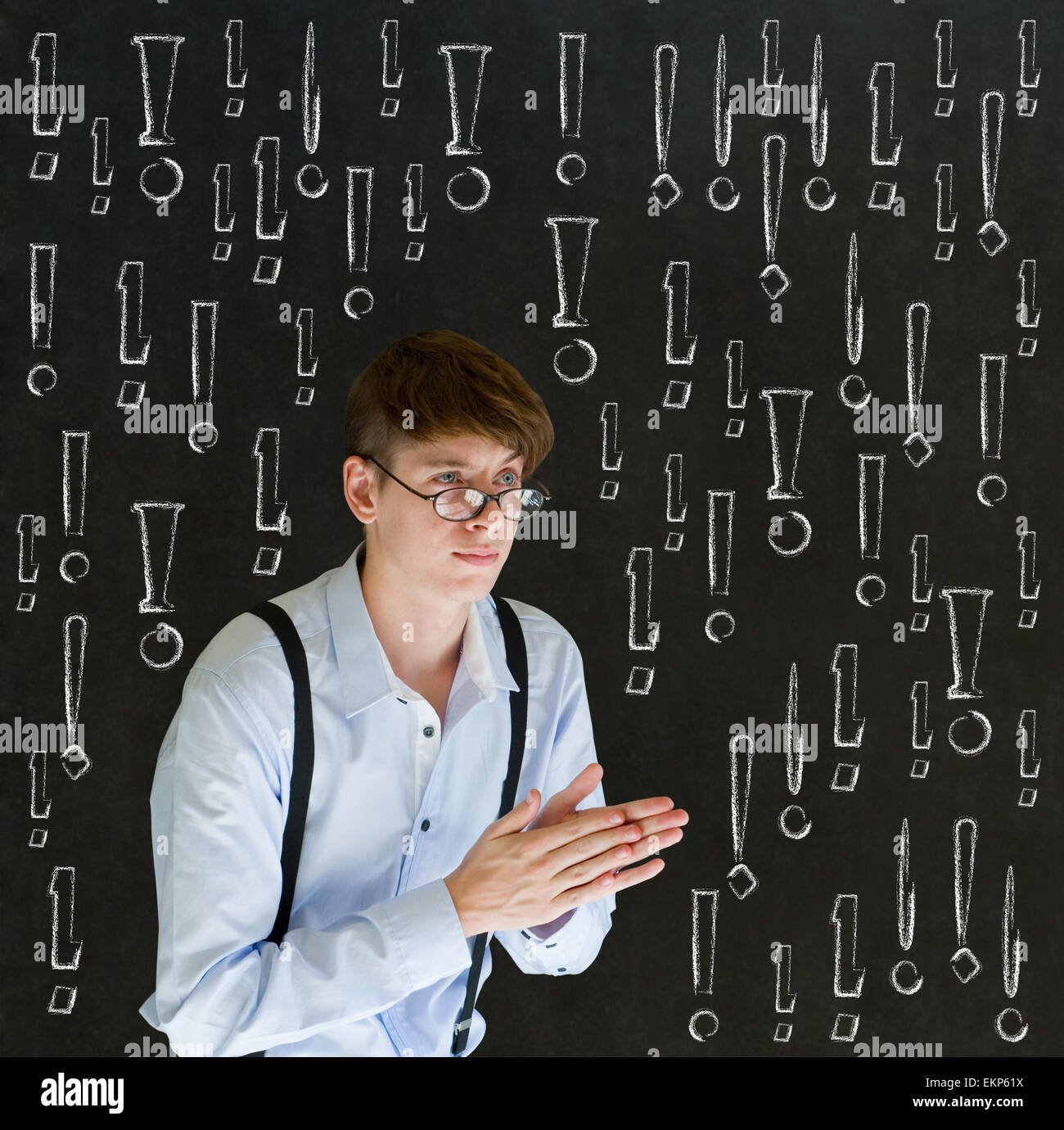 Thinking business man with chalk exclamation marks Stock Photo - Alamy