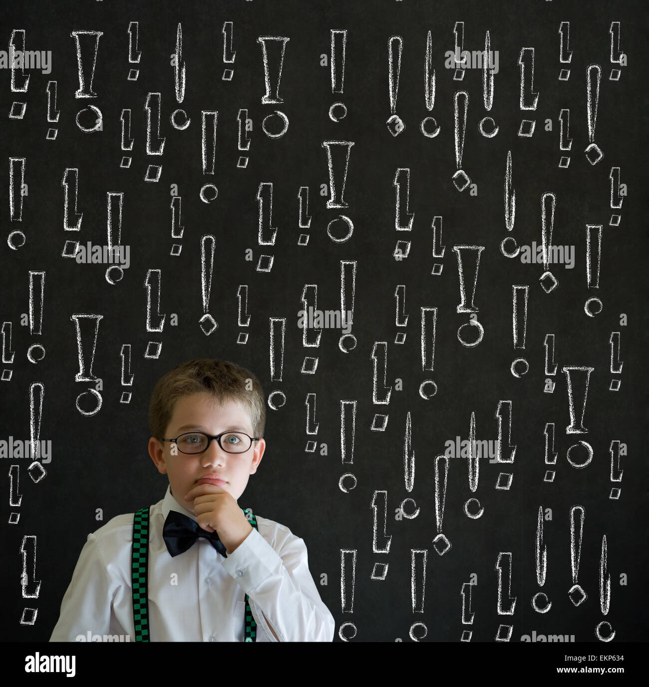 Thinking boy business man with chalk exclamation marks Stock Photo - Alamy