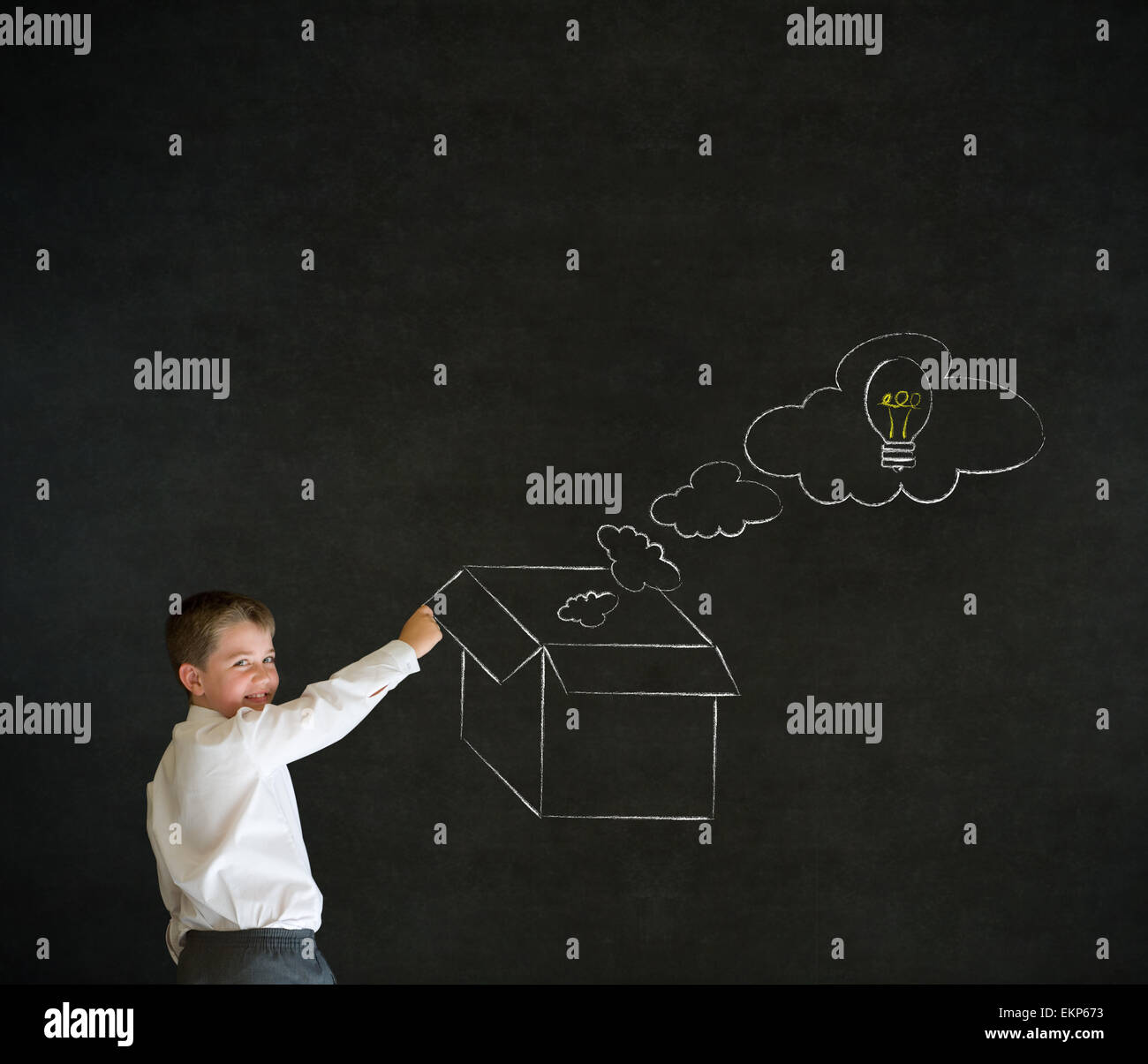 Writing boy business man with thinking out the box concept Stock Photo ...