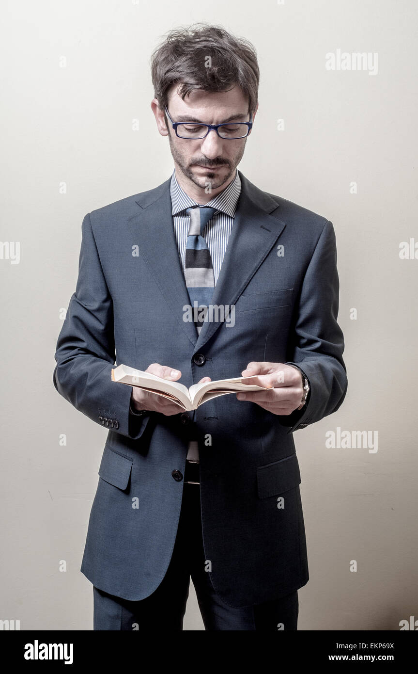 businessman reading book Stock Photo - Alamy