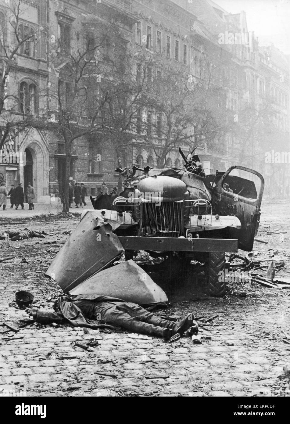The wreckage of a Soviet transport in a Budapest street, the bodies of ...