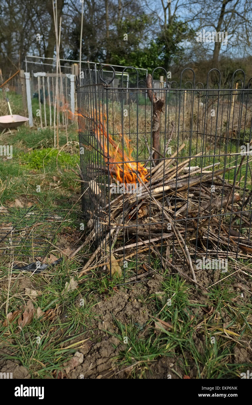 Burning wood on a bonfire in the allotment Stock Photo - Alamy