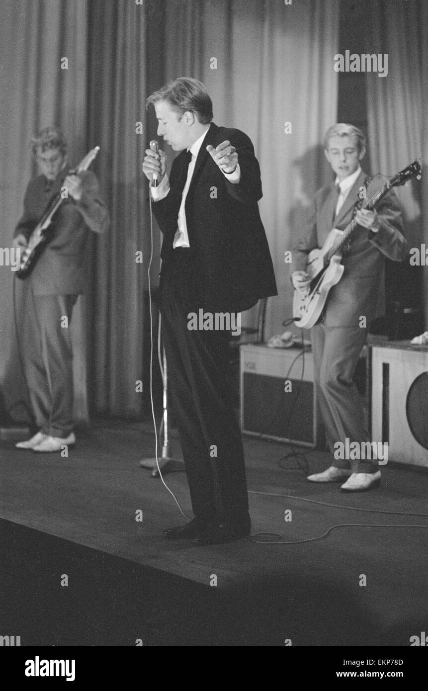 British pop singer Mike Sarne performing on stage with his band. 12th ...