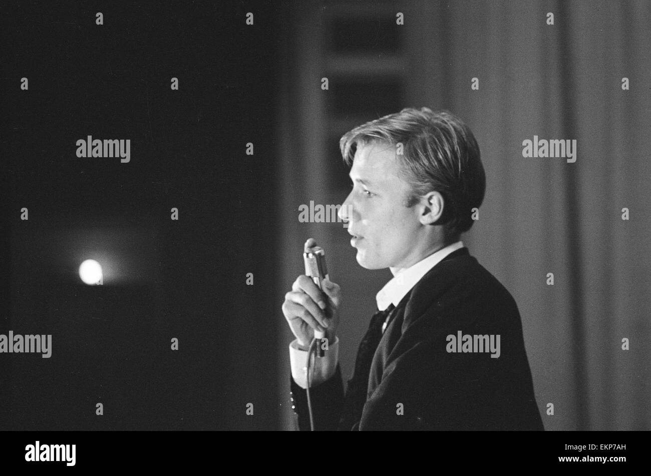 British pop singer Mike Sarne performing on stage with his band. 12th ...