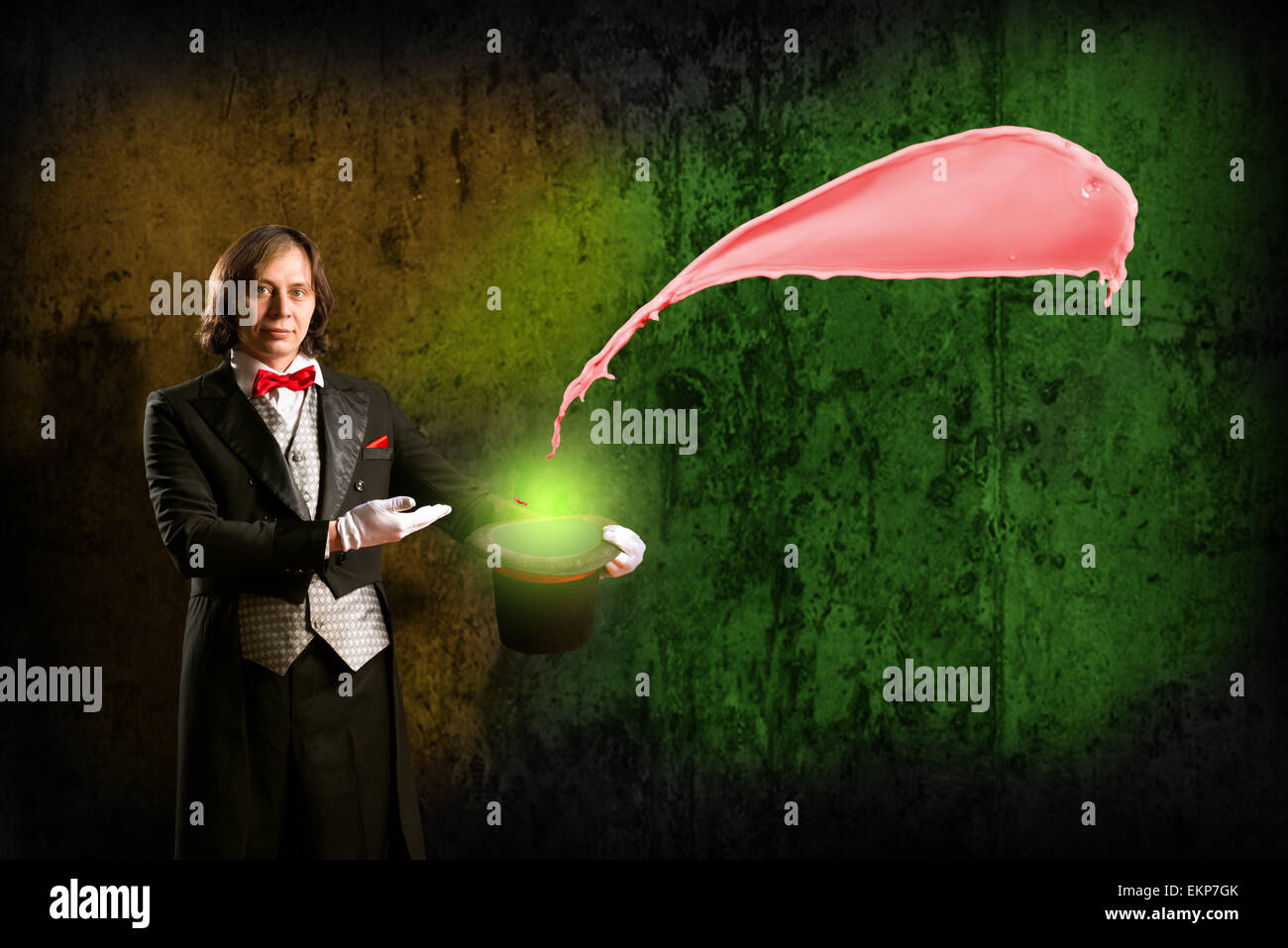 magician and splashes of color paint Stock Photo - Alamy