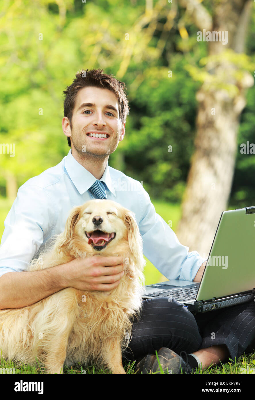 Businessman's best friend Stock Photo - Alamy