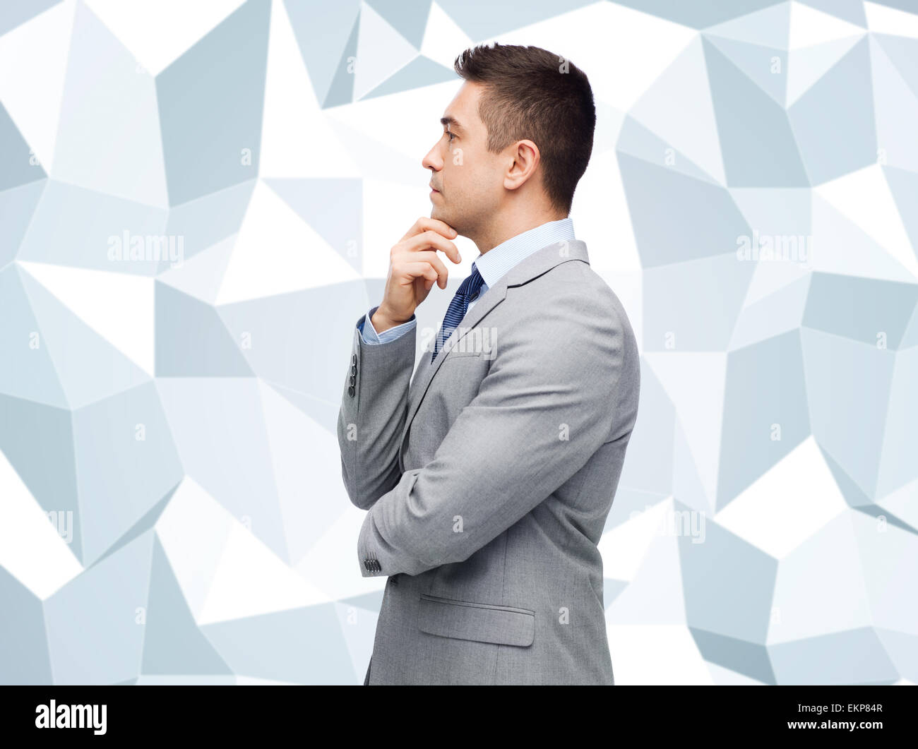 thinking businessman in suit making decision Stock Photo - Alamy
