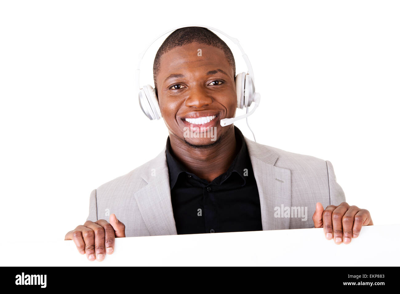 Successful call center worker with blank board Stock Photo - Alamy