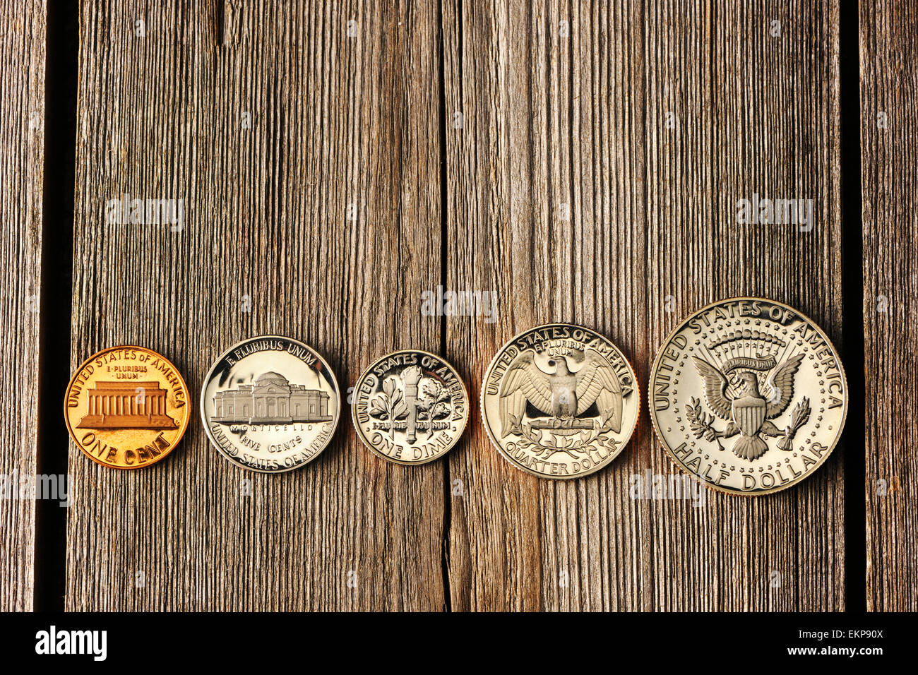 US cent coins over wooden background Stock Photo - Alamy
