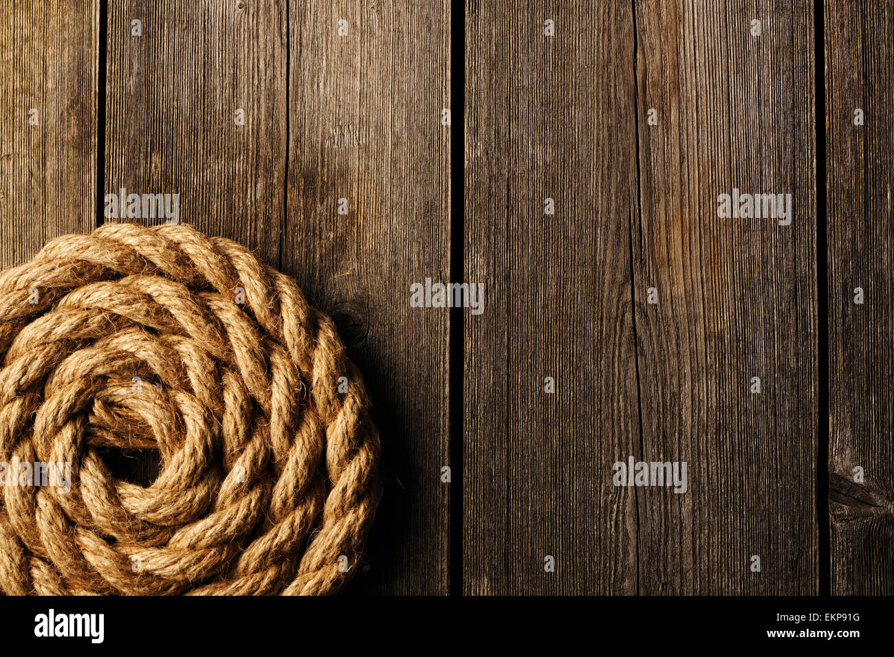 Rope over wooden background Stock Photo - Alamy