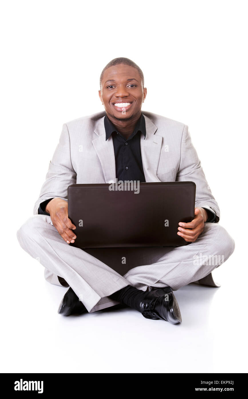 Successful businessman working on laptop Stock Photo - Alamy