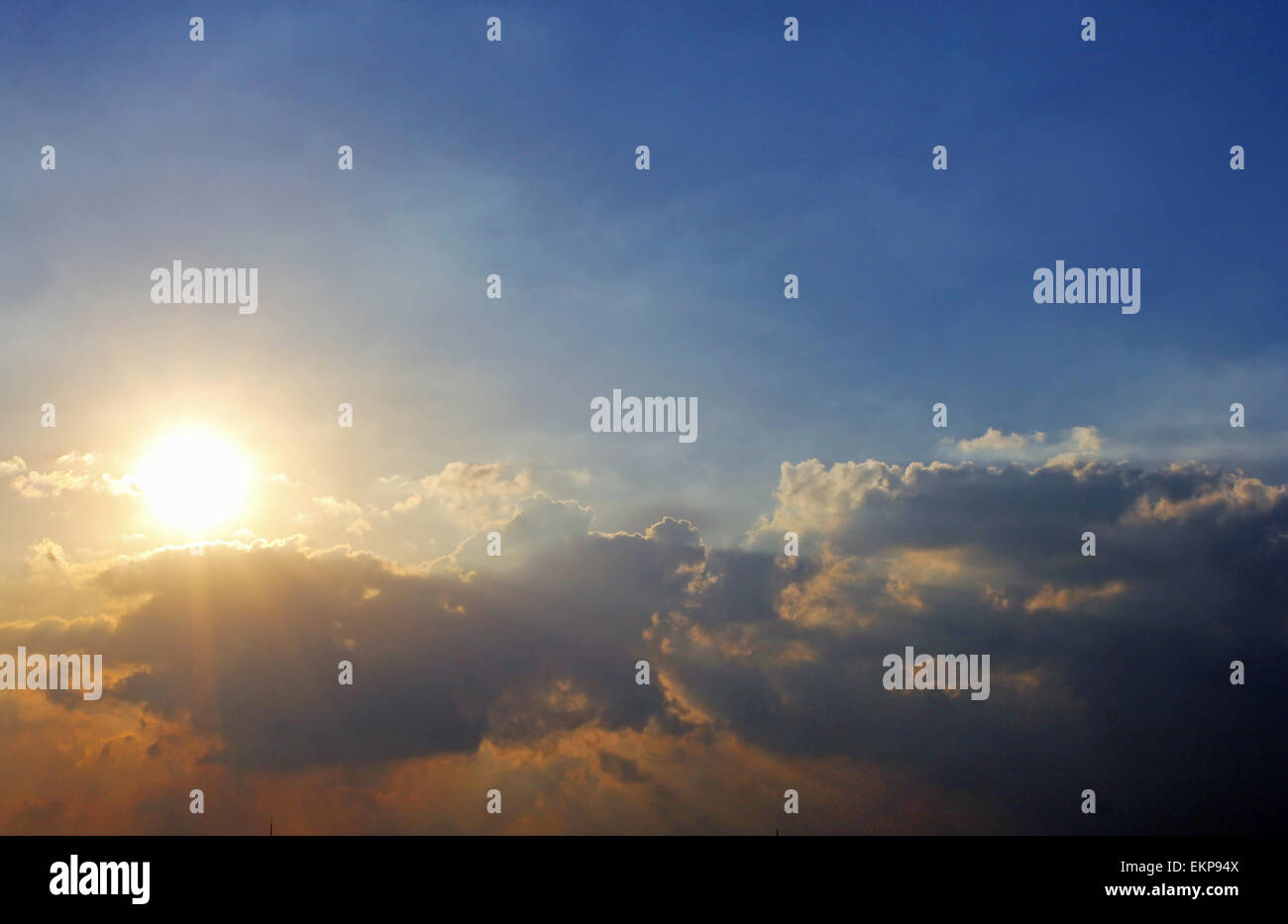 Dramatic sky with clouds and sun Stock Photo - Alamy