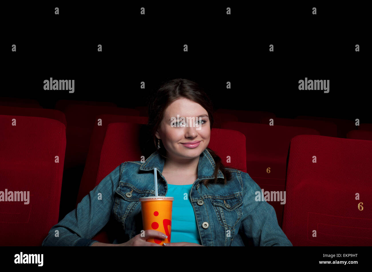 woman in cinema Stock Photo - Alamy