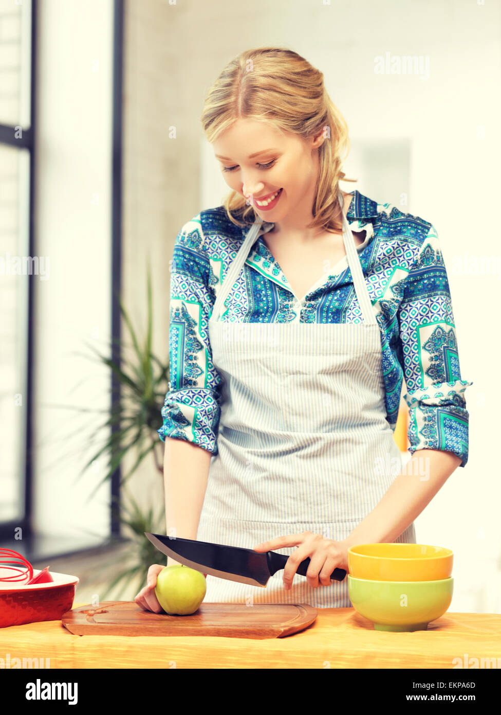 beautiful woman in the kitchen Stock Photo - Alamy