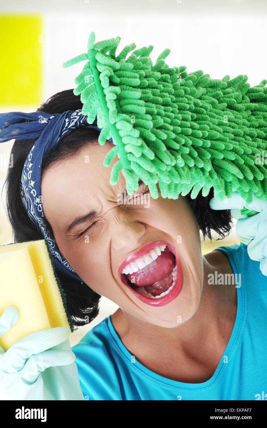 Tired and exhausted cleaning woman Stock Photo - Alamy