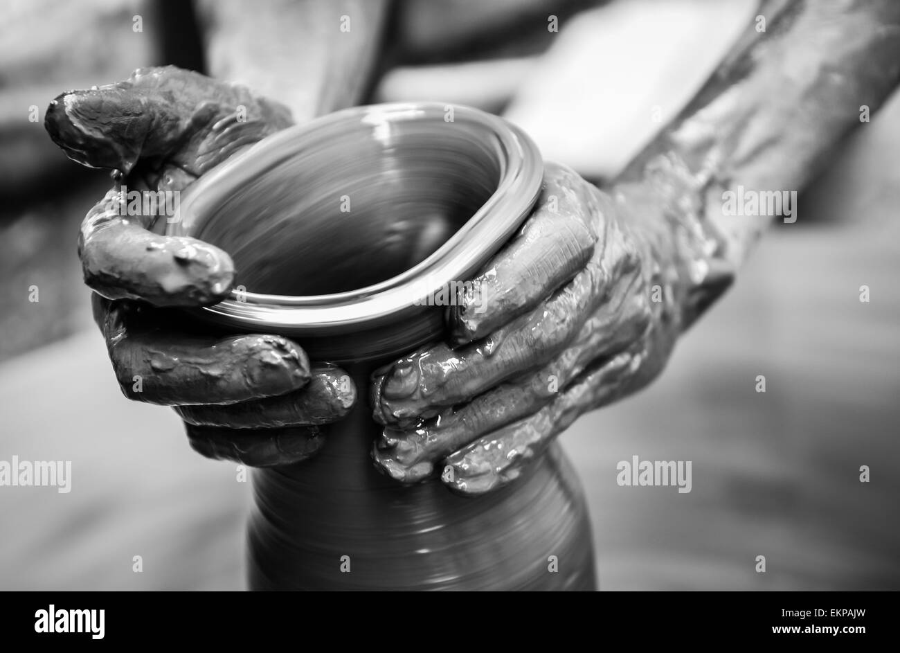 Craftsman hand making pottery Black and White Stock Photos & Images - Alamy