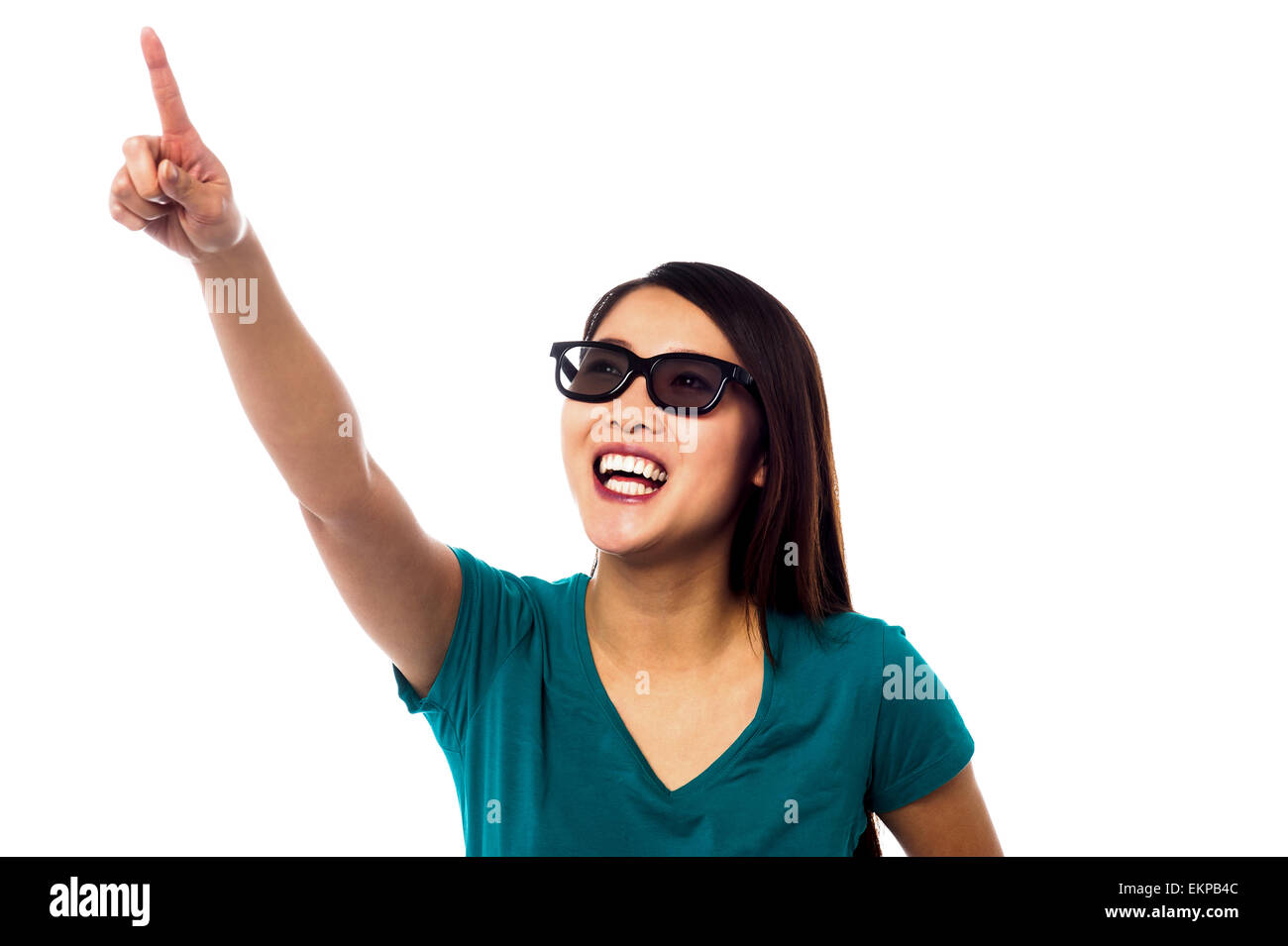 Jolly young woman pointing hi-res stock photography and images - Alamy
