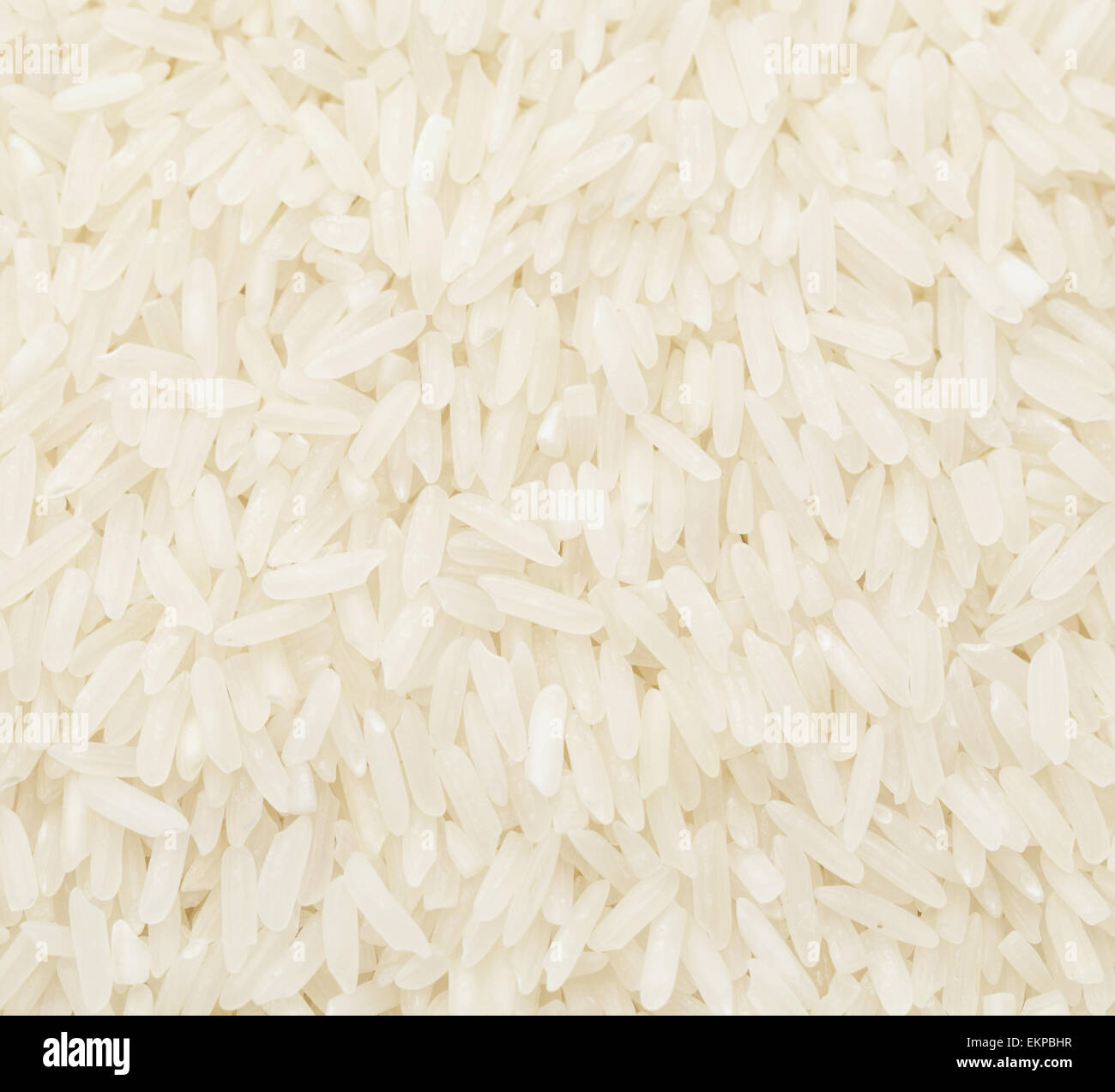 Uncooked white rice close up Stock Photo - Alamy