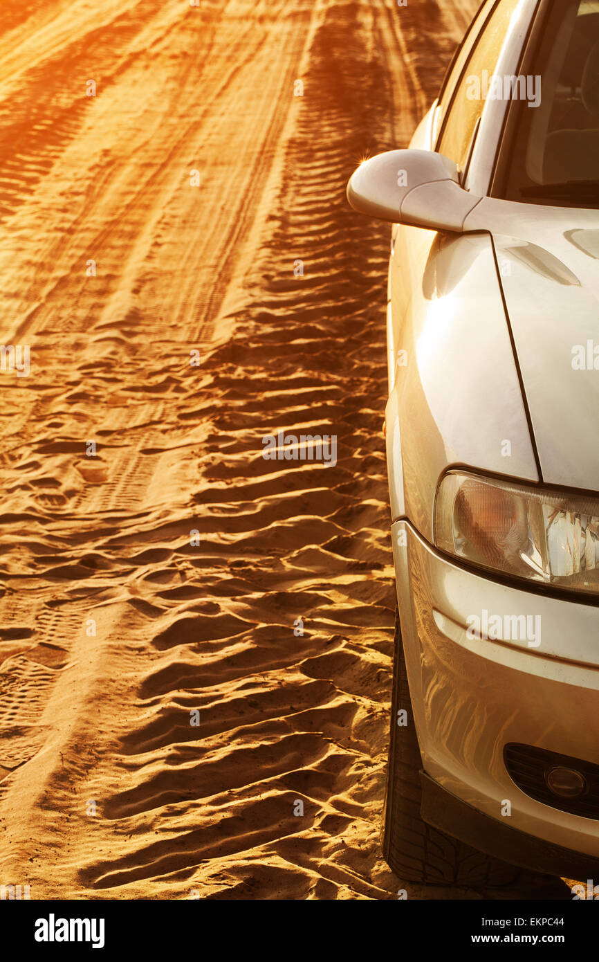 Trace of wheels and car on a road Stock Photo - Alamy