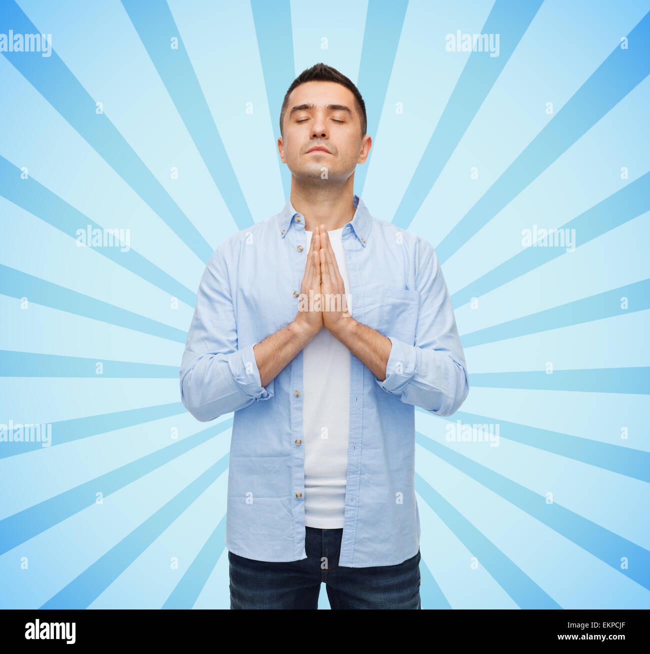happy man praying Stock Photo - Alamy