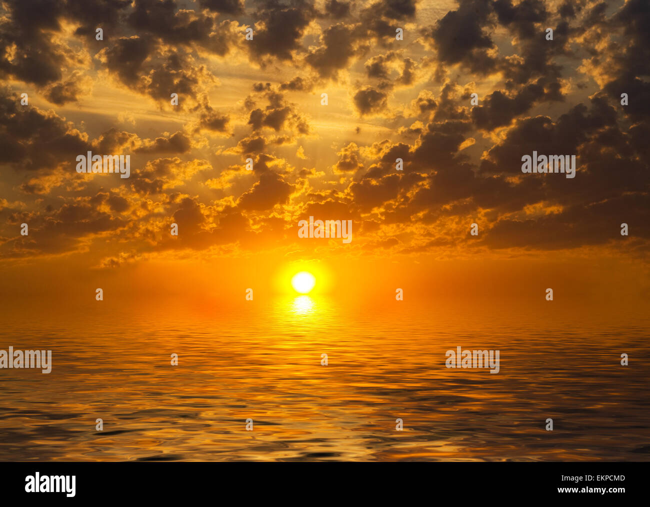 sunset over water Stock Photo - Alamy