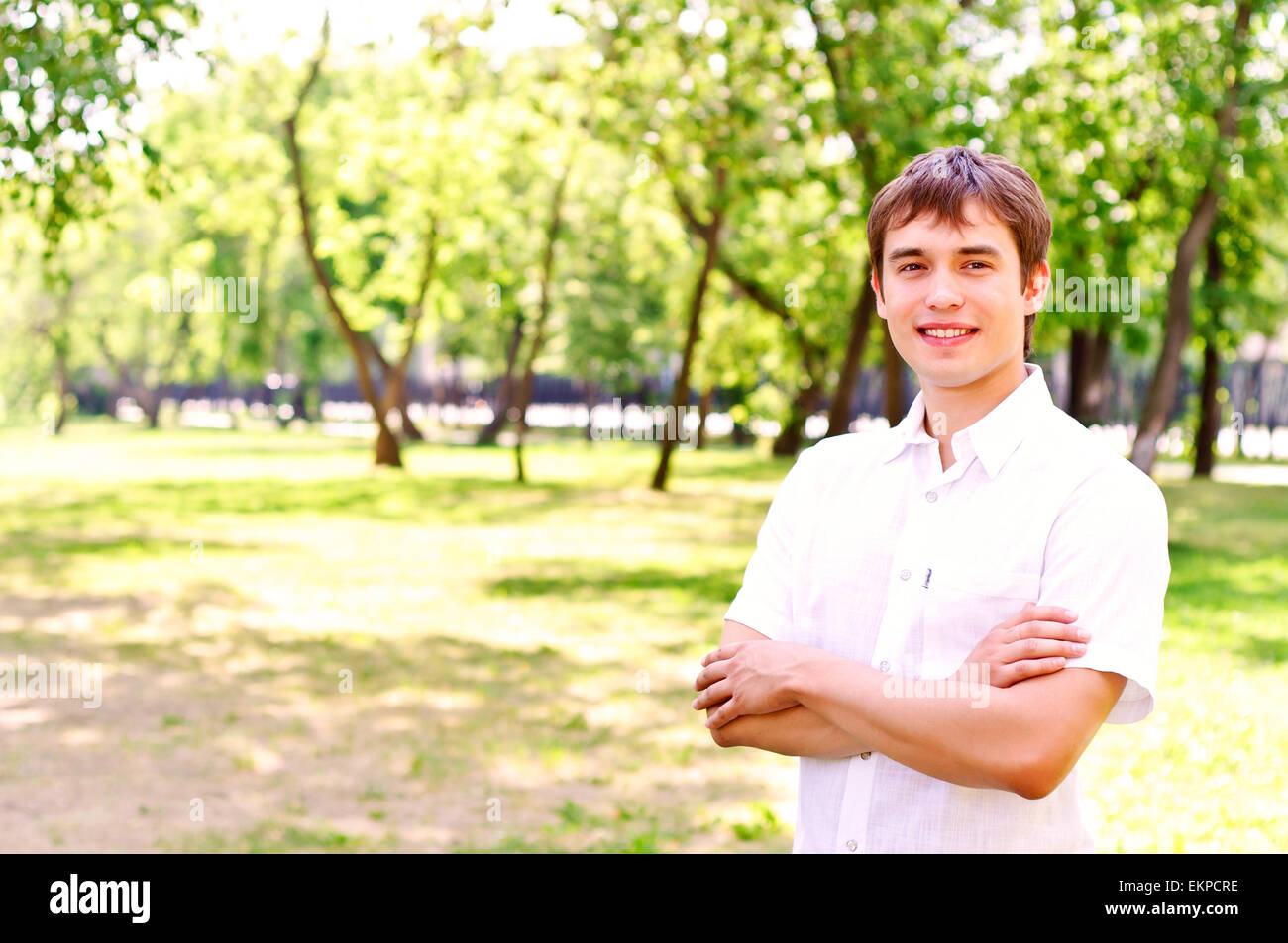 Portrait of man outside in park Stock Photo - Alamy