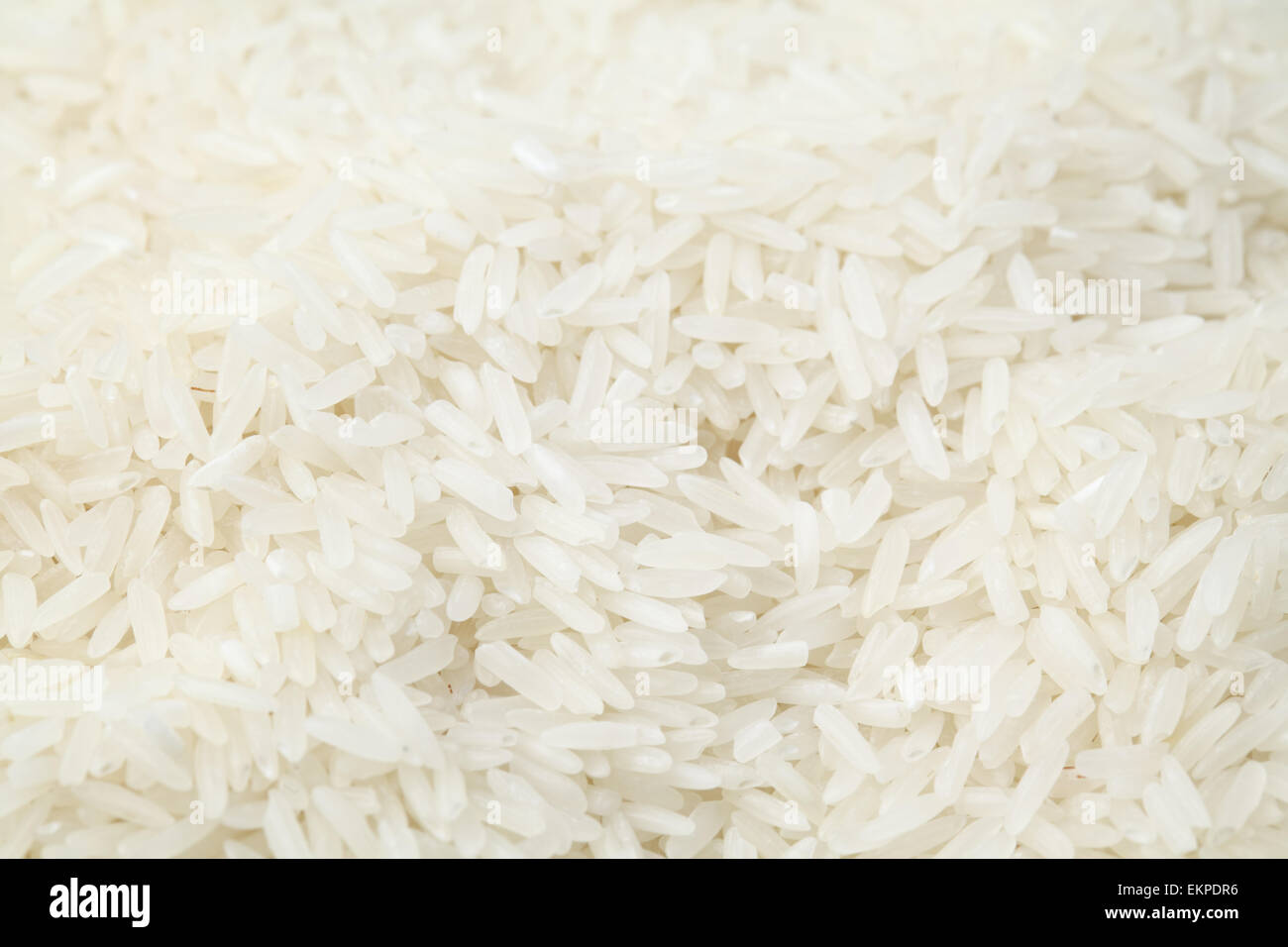 Uncooked white rice Stock Photo - Alamy