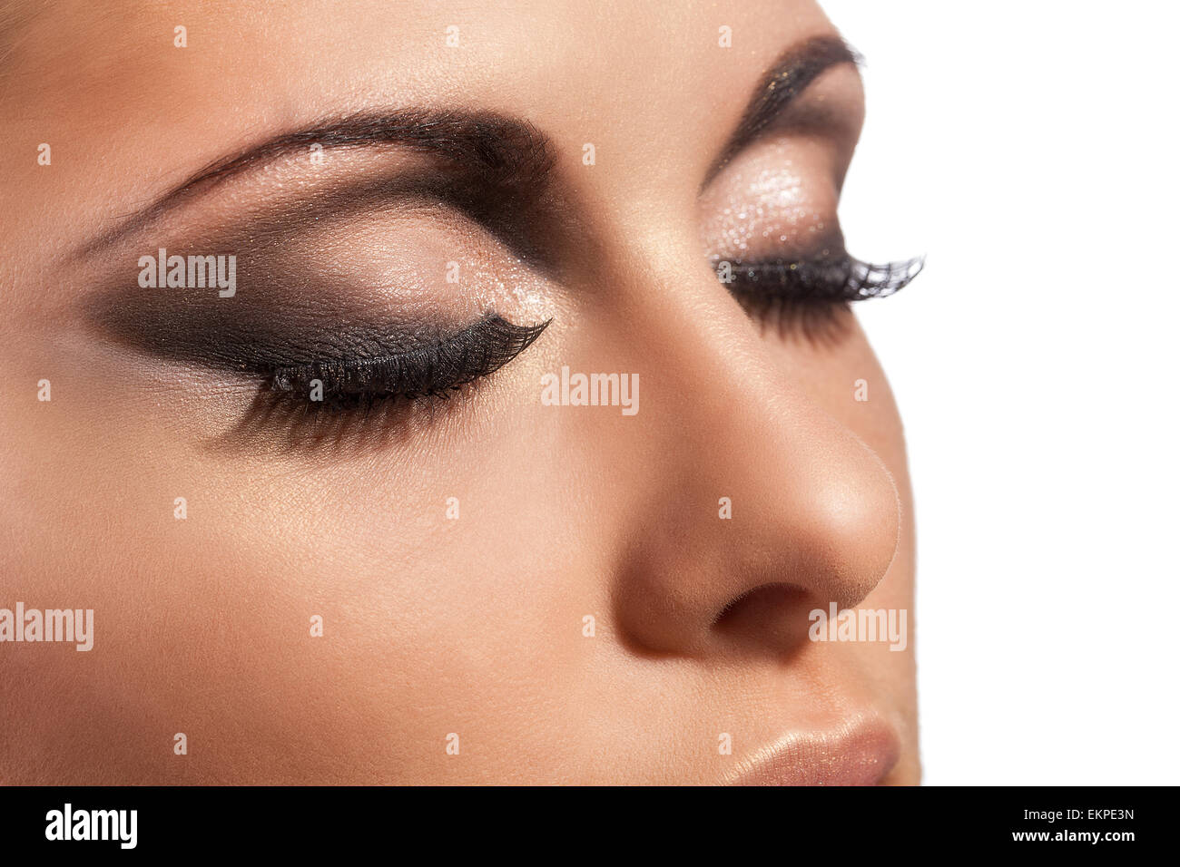 Beautiful young woman with evening makeup Stock Photo - Alamy