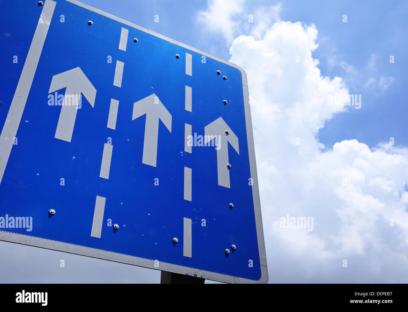 Crossroad signage with arrow Stock Photo - Alamy