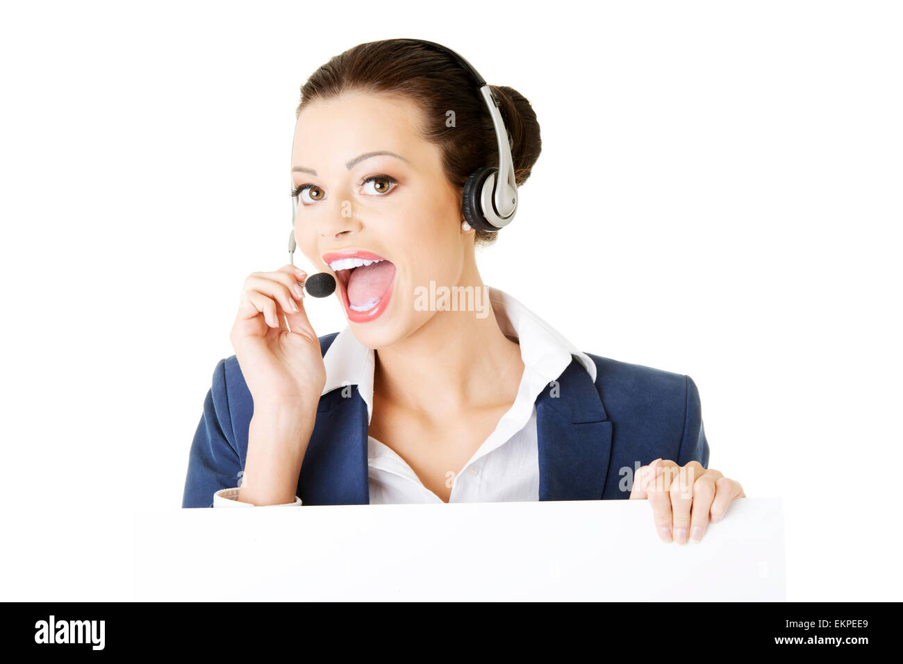 Pretty young call center worker holding blank sign board Stock Photo ...