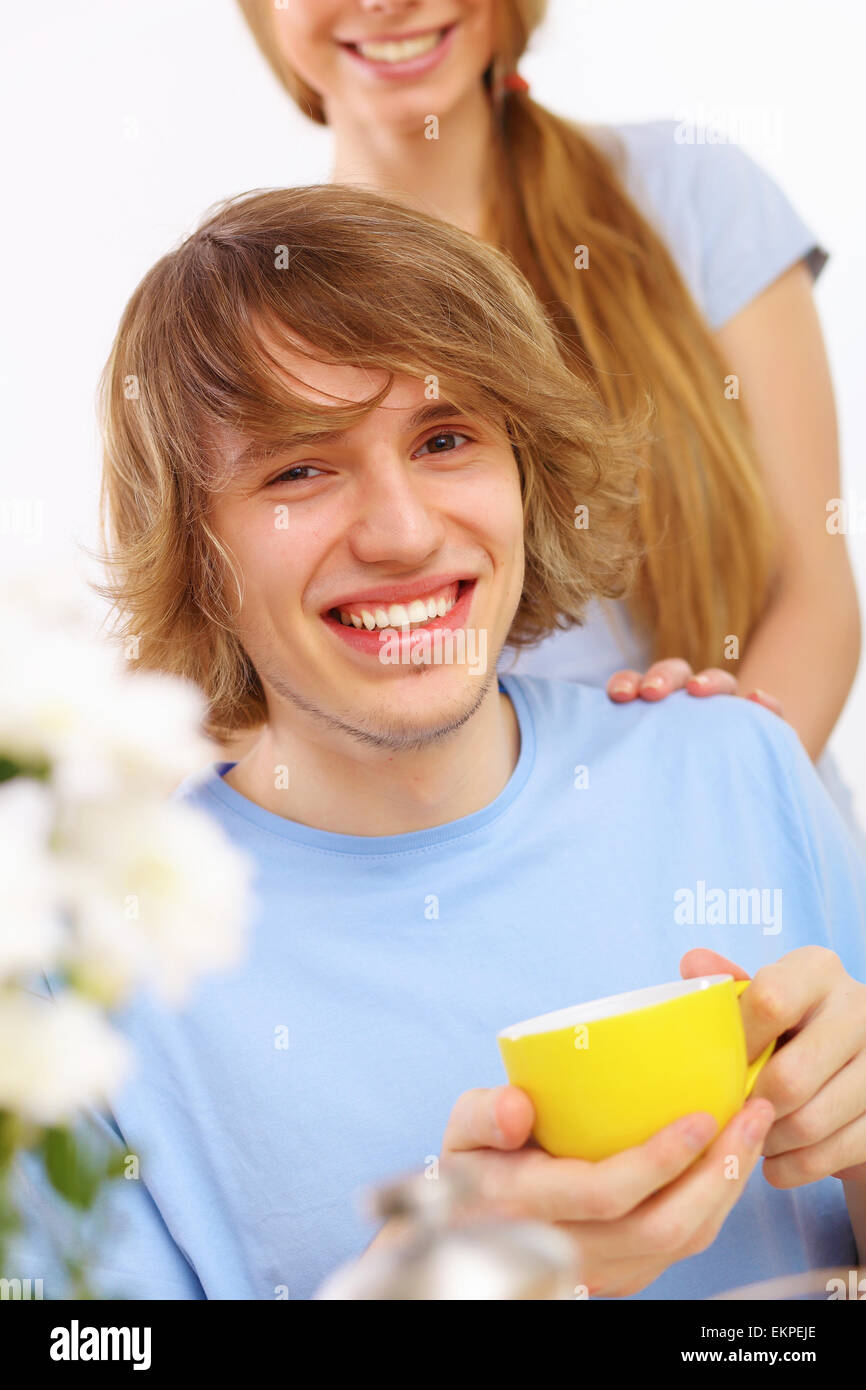 Young happy man drinking tea Stock Photo - Alamy Young happy man drinking tea Stock Photo - Alamy