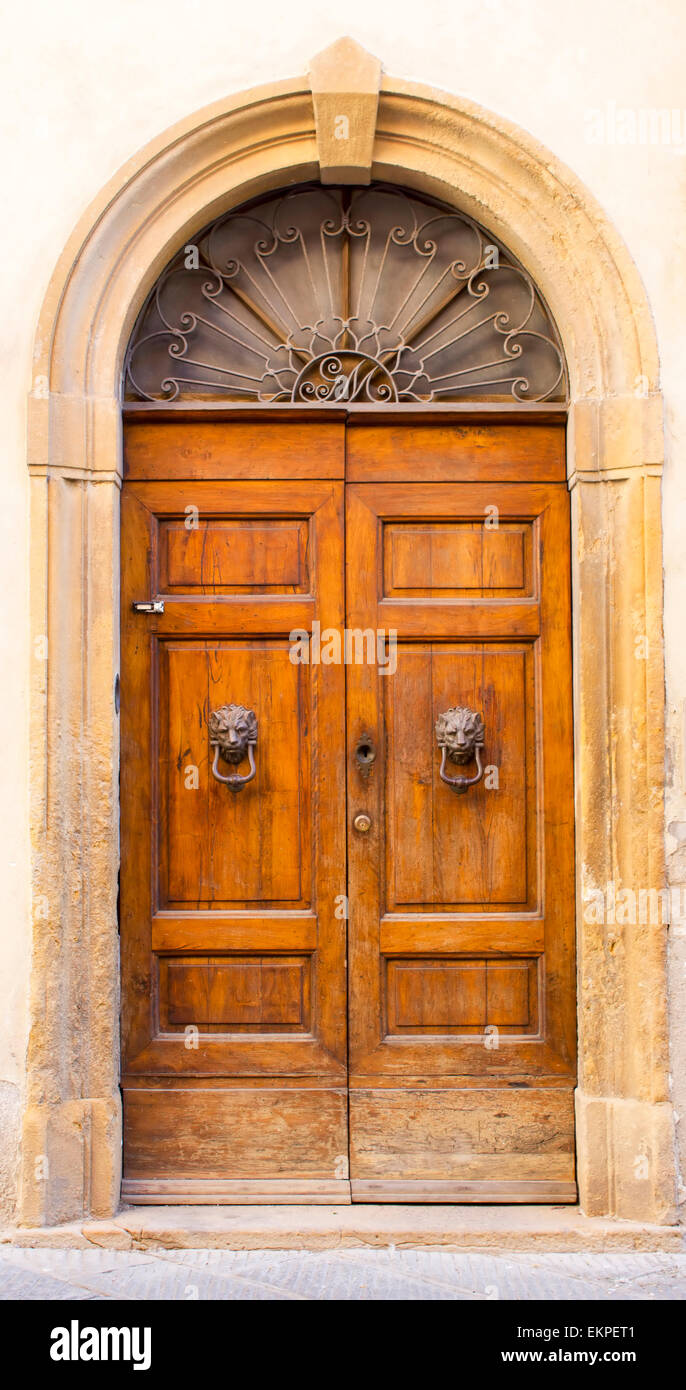 lovely tuscan doors, San Gimignano, Italy Stock Photo - Alamy