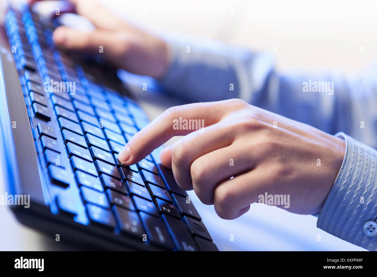 Click! Hands of a man on keyboard Stock Photo - Alamy