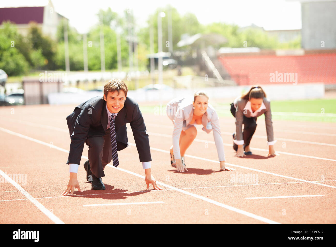 Business people racing on track hi-res stock photography and images - Alamy