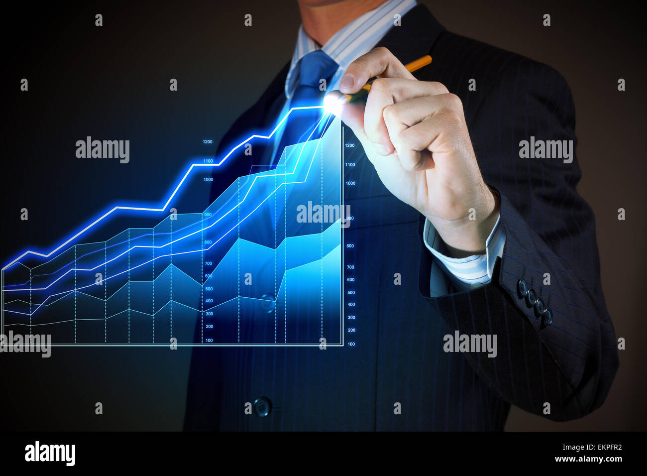 Business man drawing graphics Stock Photo - Alamy