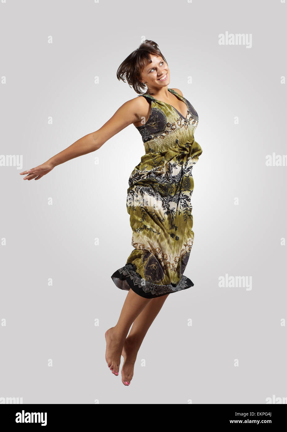 young woman dancing and jumping Stock Photo - Alamy