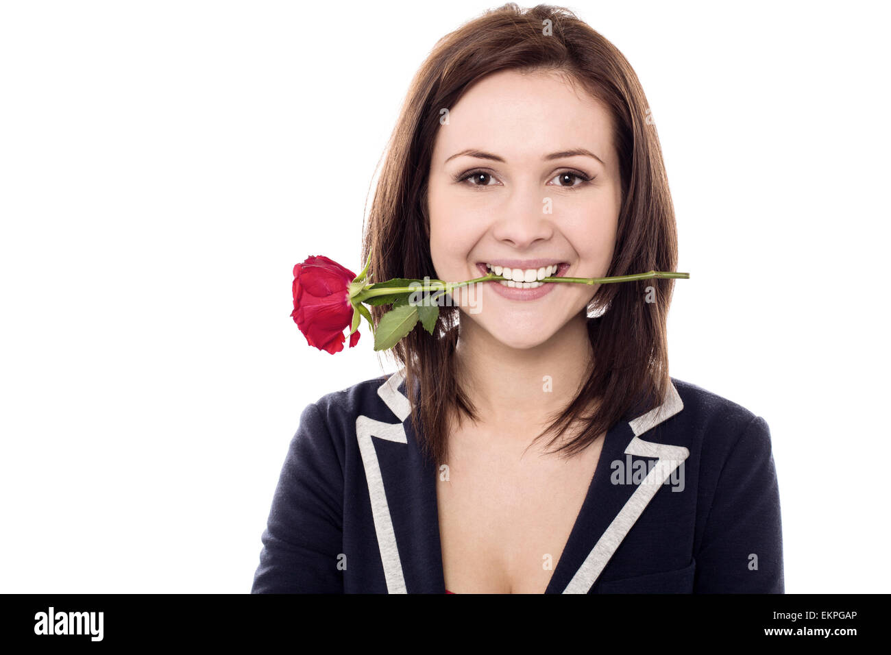Young female holding rose between her teeth Stock Photo - Alamy