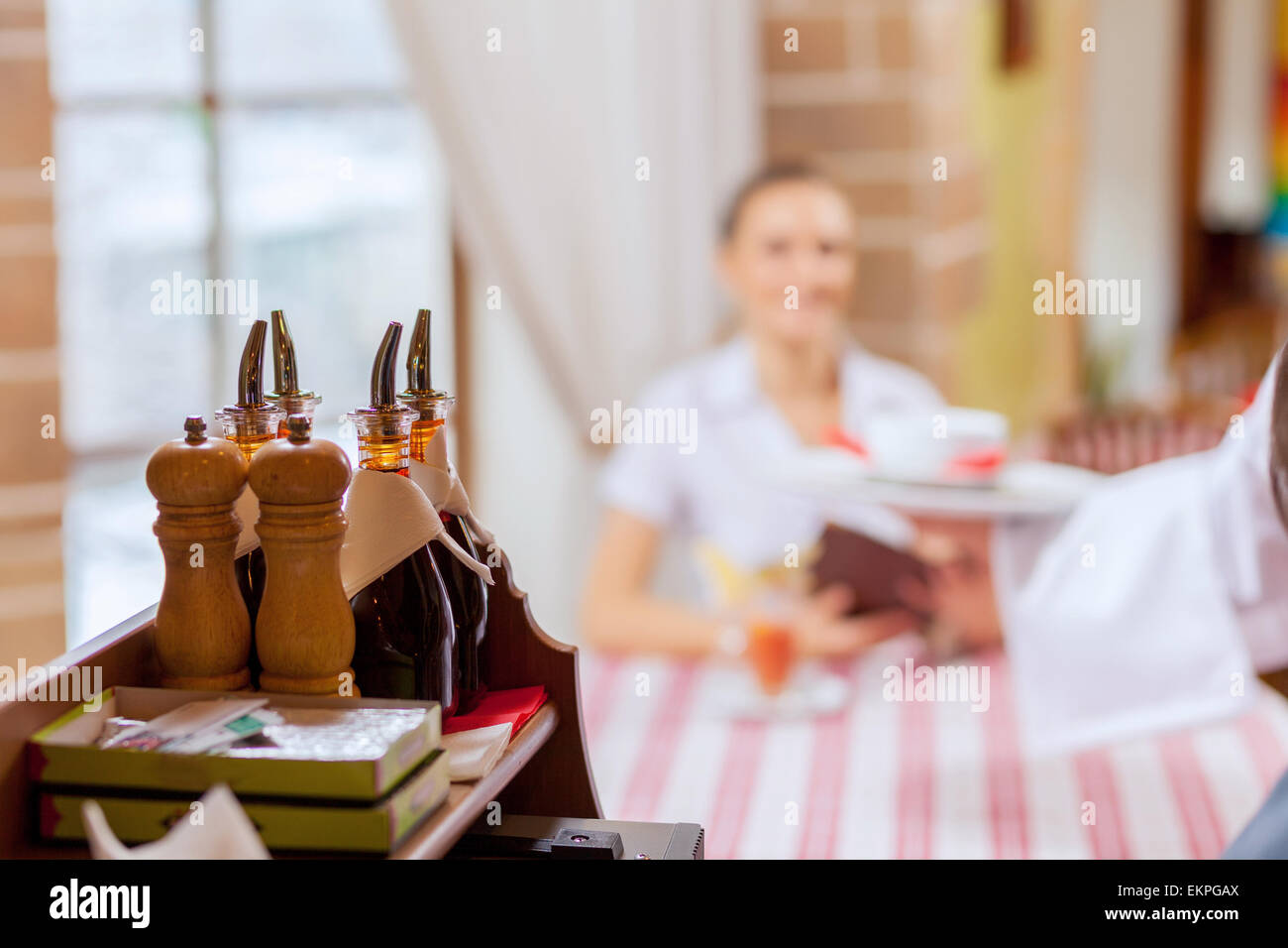 Pretty woman in restaurant Stock Photo - Alamy