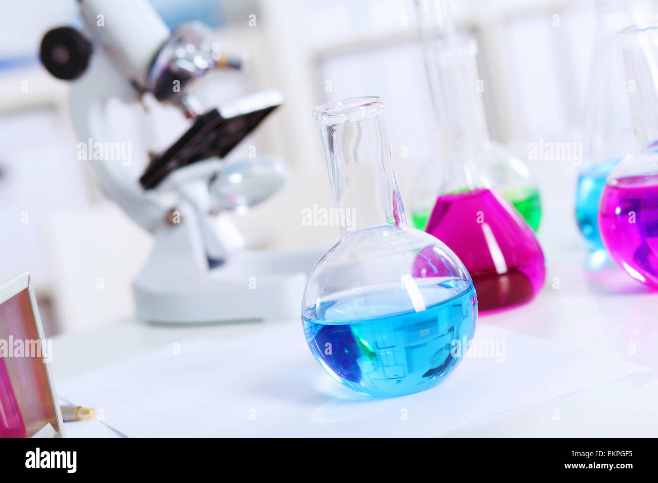 Chemistry laboratory glassware with colour liquids Stock Photo - Alamy