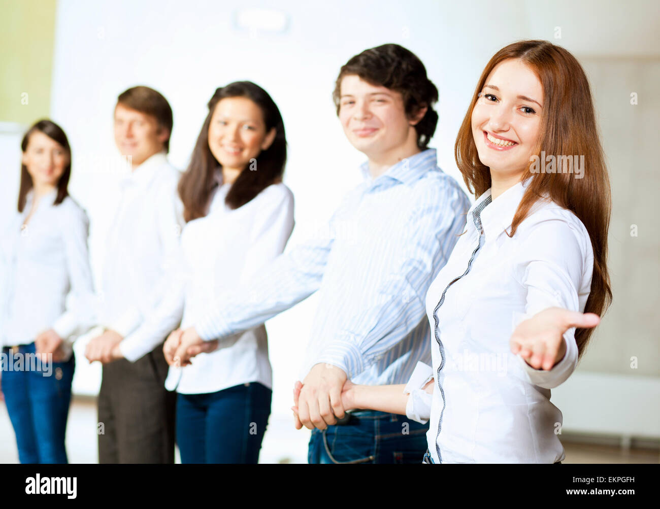 Five students smiling Stock Photo - Alamy