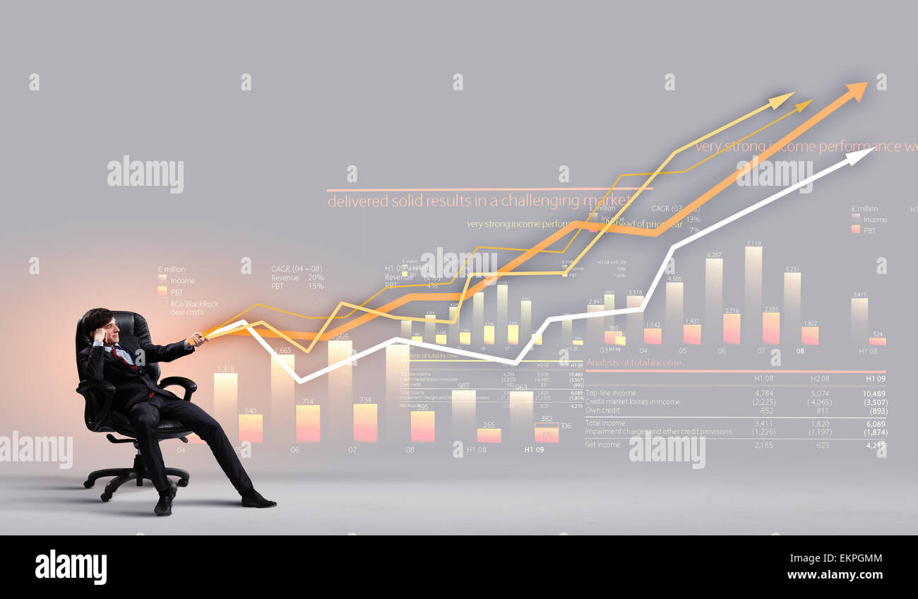 Businessman pulling graph Stock Photo - Alamy