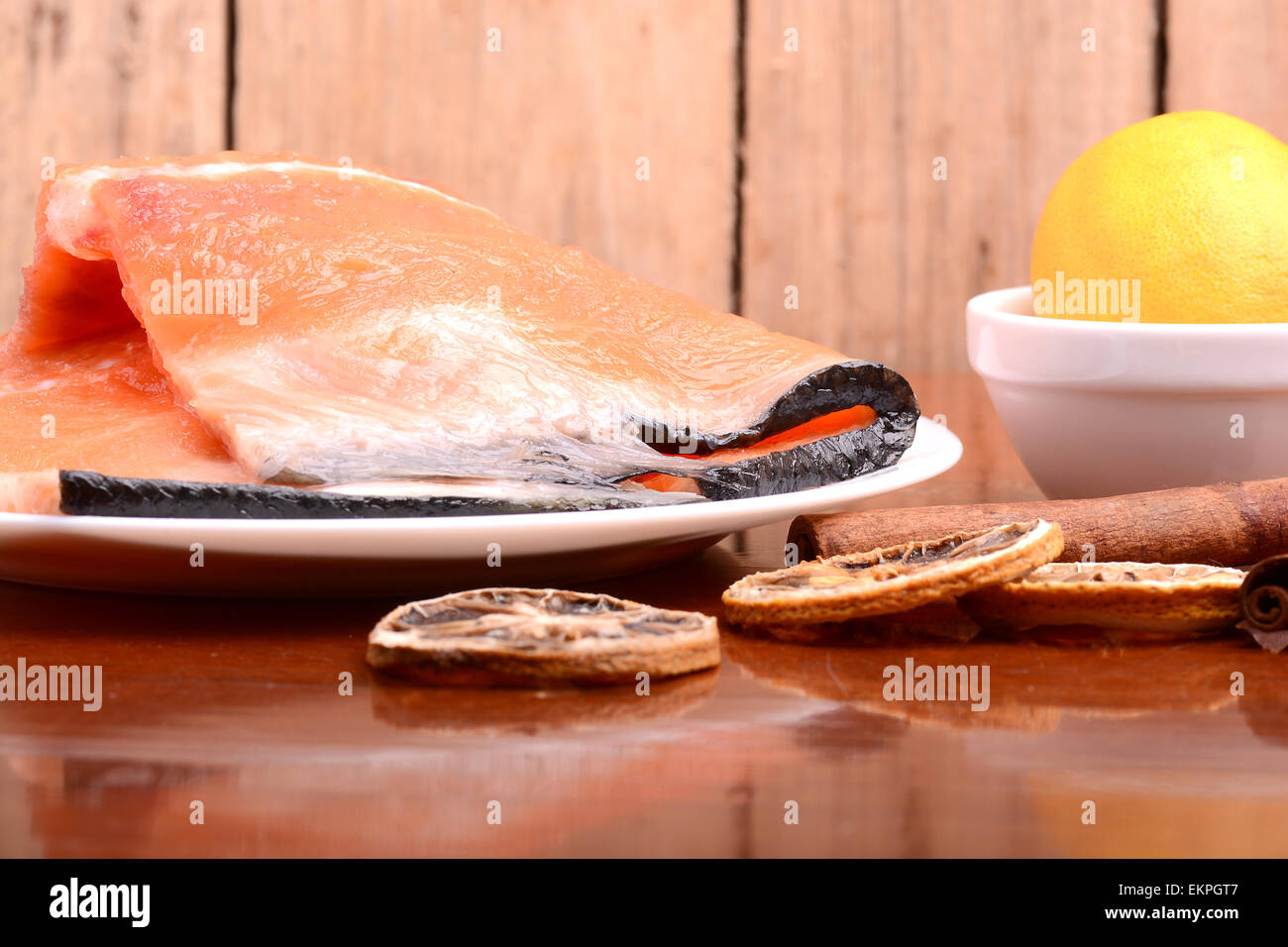 Slice of red fish salmon with fruits and cinnamon Stock Photo - Alamy
