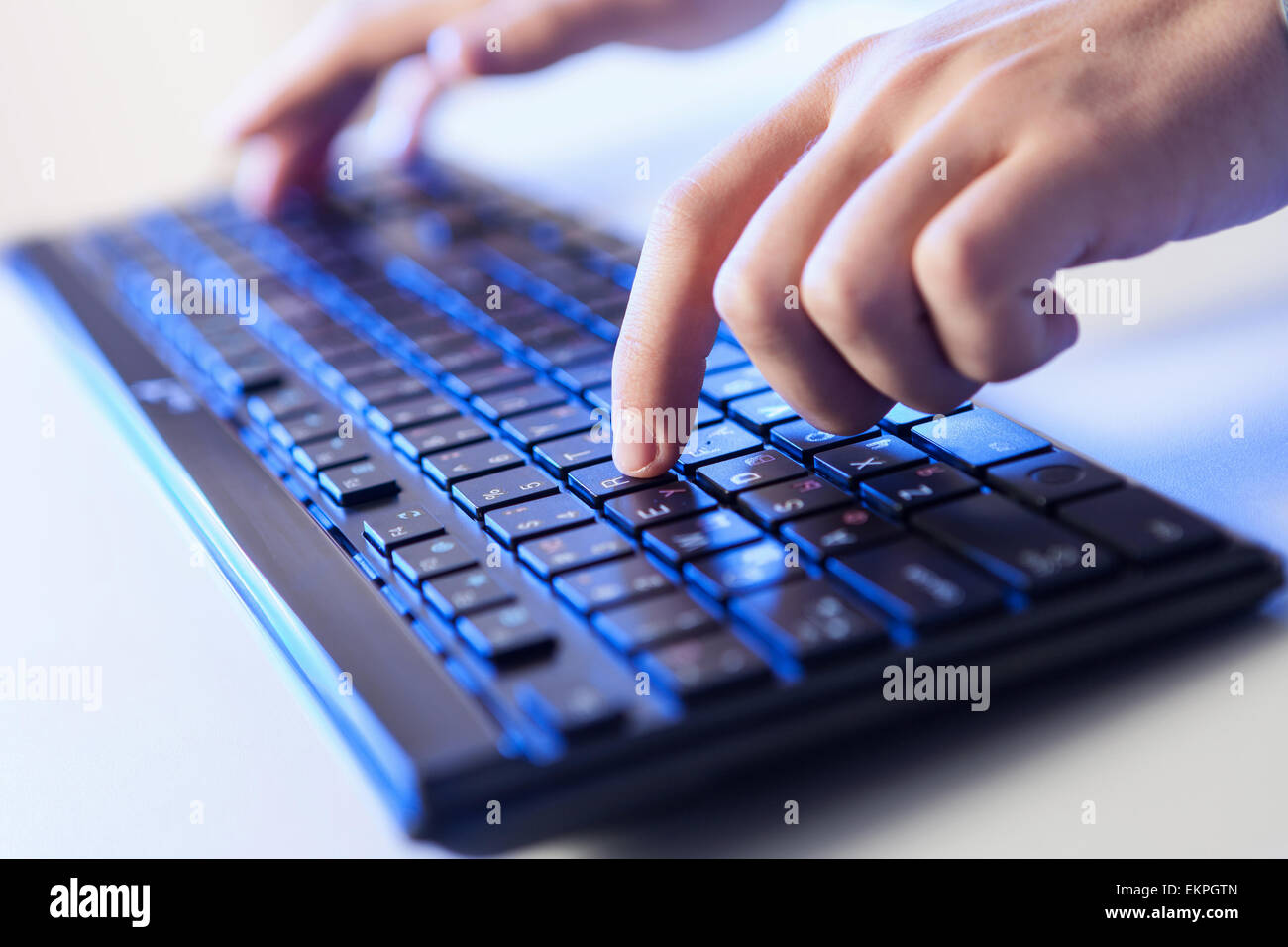 Click! Hands of a man on keyboard Stock Photo - Alamy
