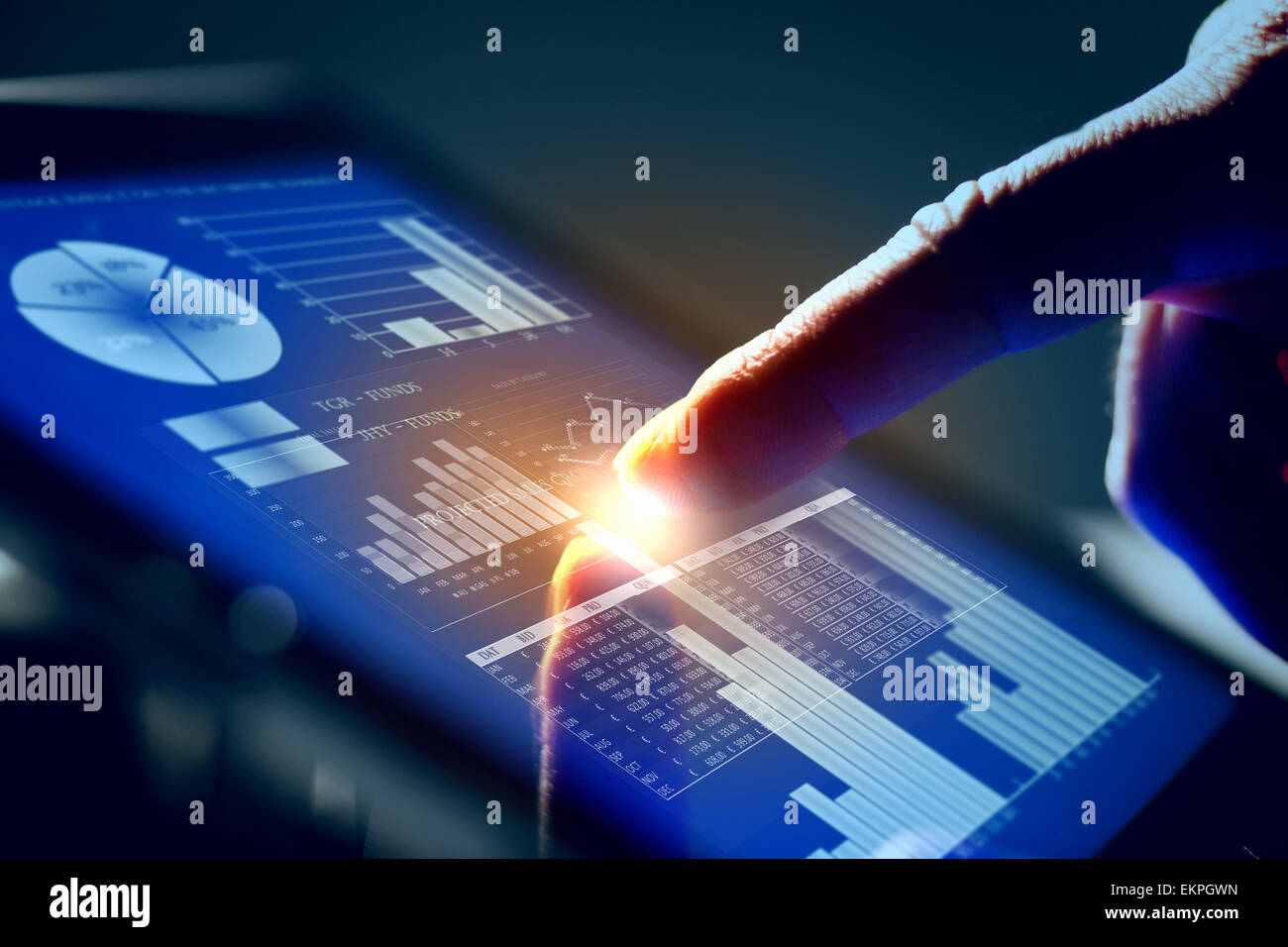Closeup of finger touching tablet-pc screen Stock Photo - Alamy