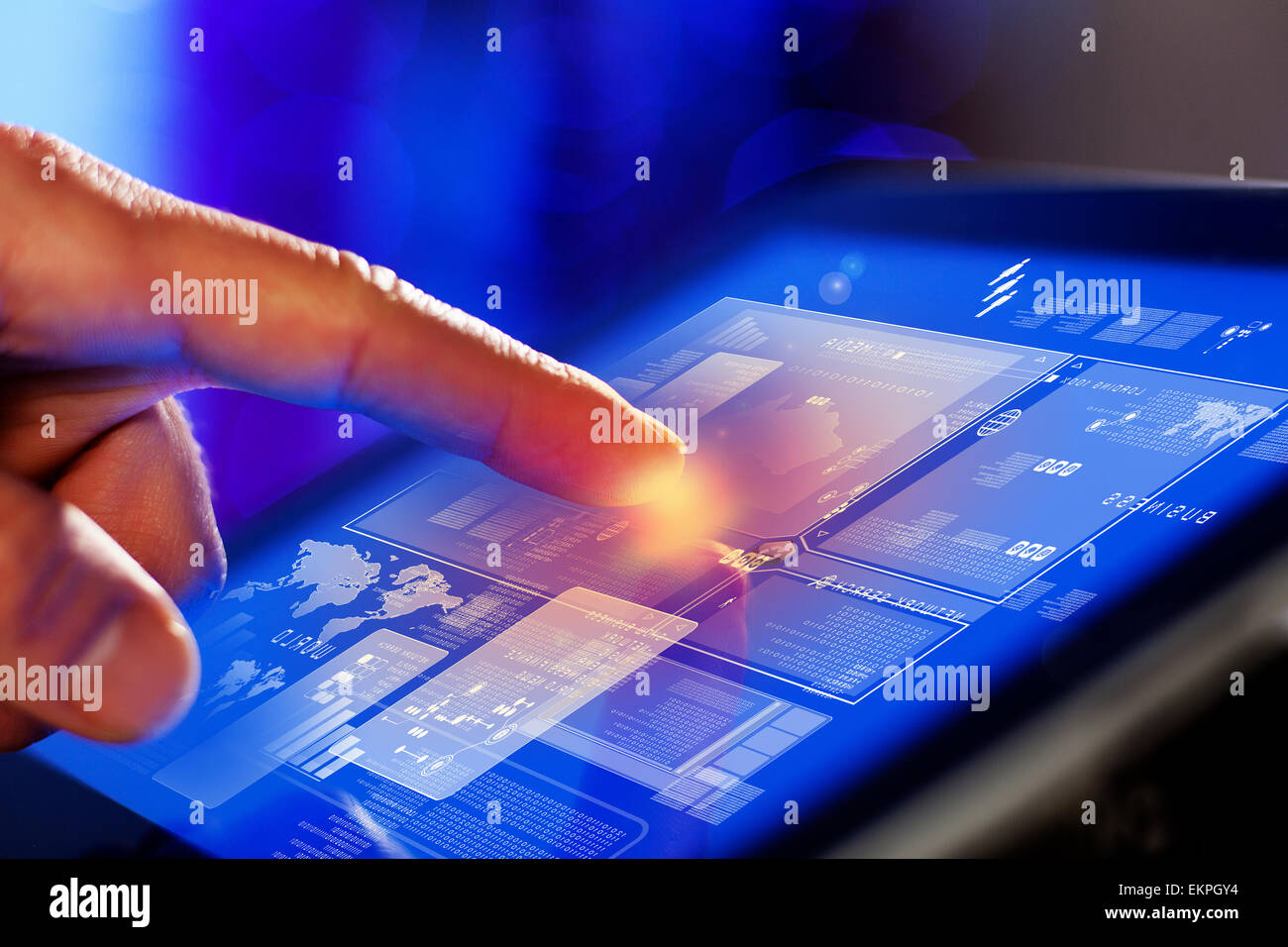 Closeup of finger touching tablet-pc screen Stock Photo - Alamy