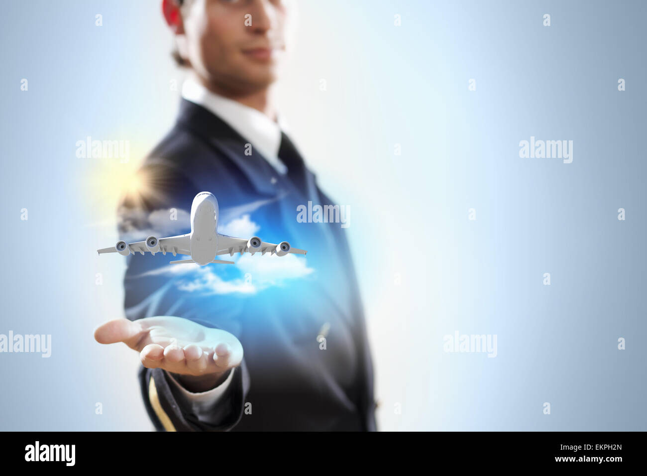 Image of pilot with plane in hand Stock Photo - Alamy