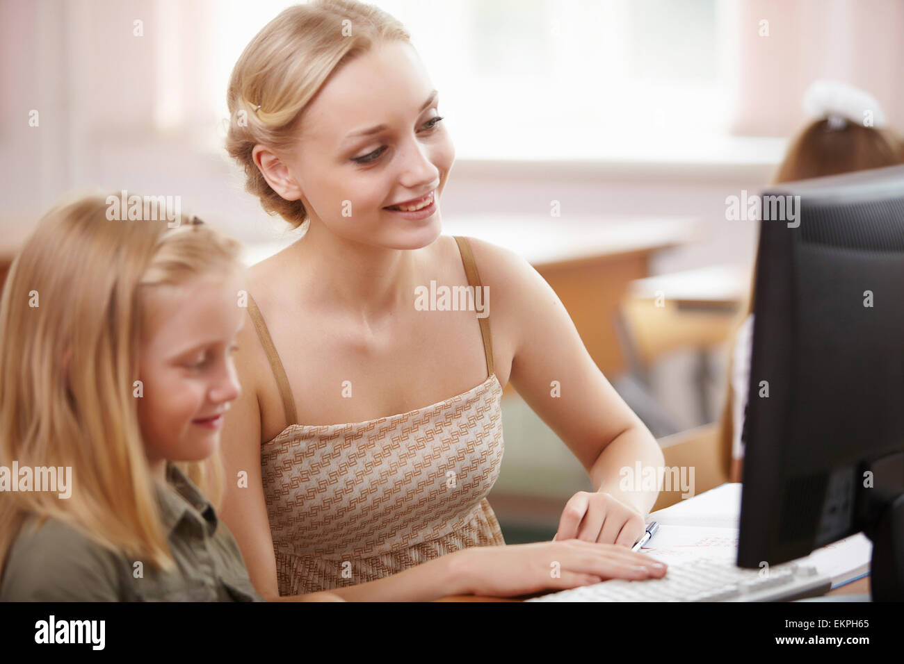Little girl at school class Stock Photo - Alamy